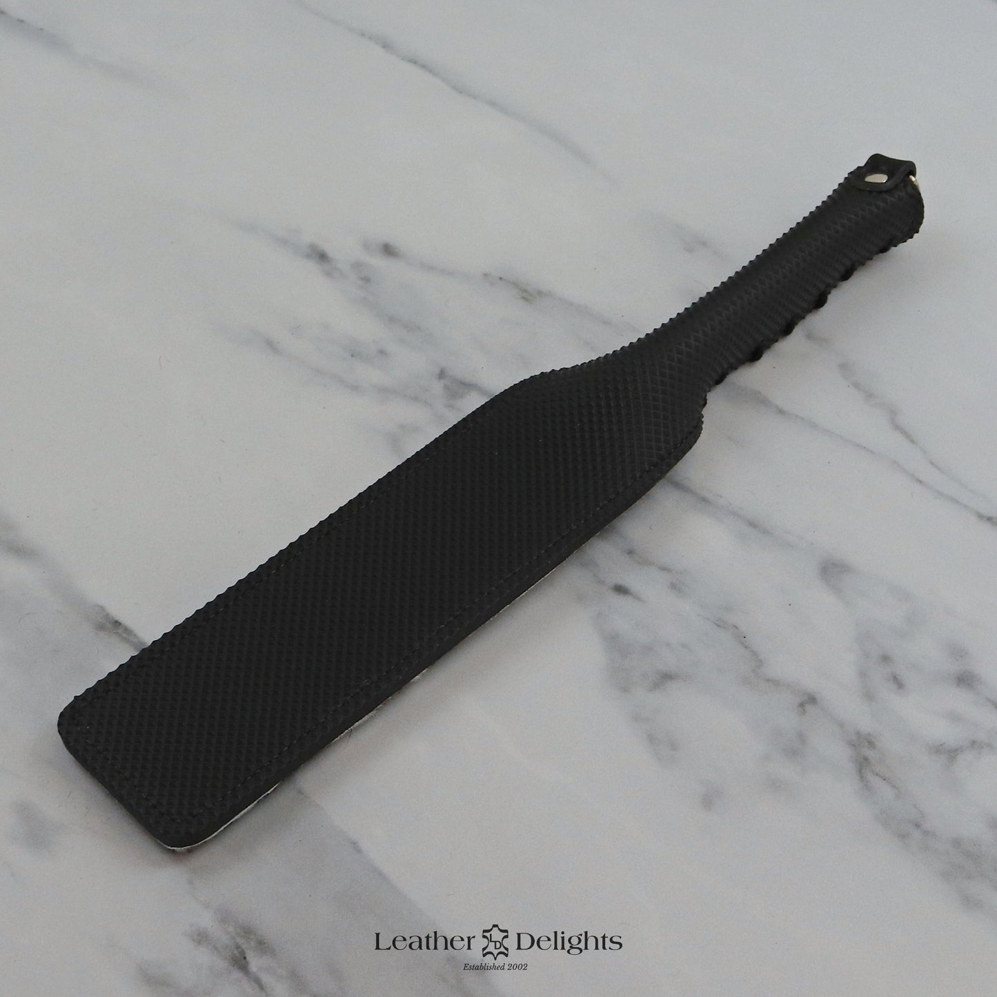 Double Cheek Slapper - Animal Print Sheepskin & Black Dimpled Rubber ...