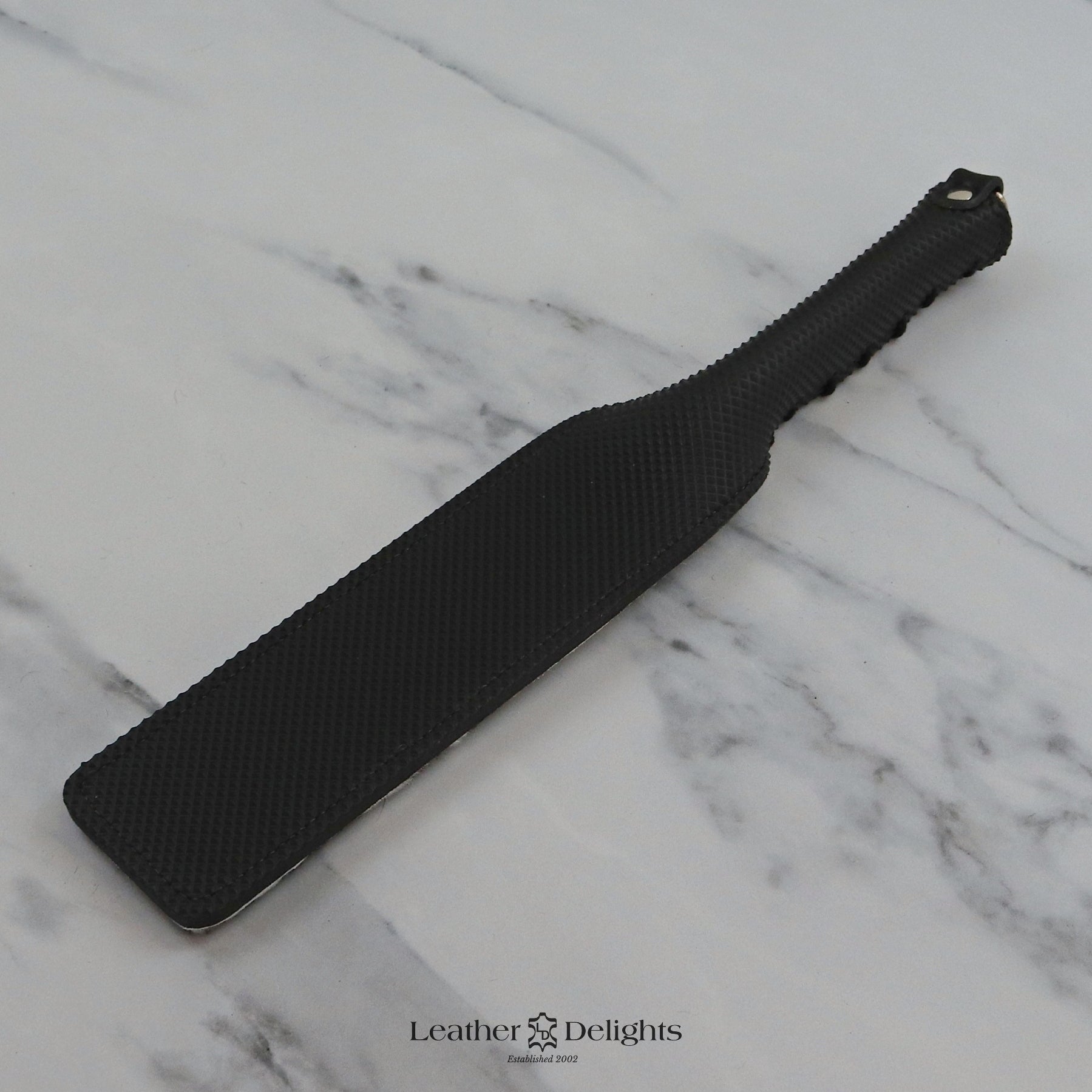 Double Cheek Slapper - Animal Print Sheepskin & Black Dimpled Rubber ...