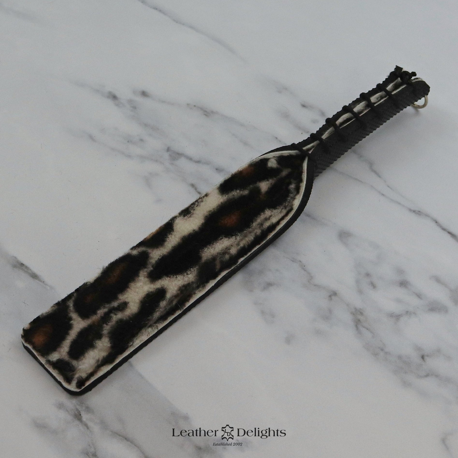 Double Cheek Slapper - Animal Print Sheepskin & Black Dimpled Rubber ...