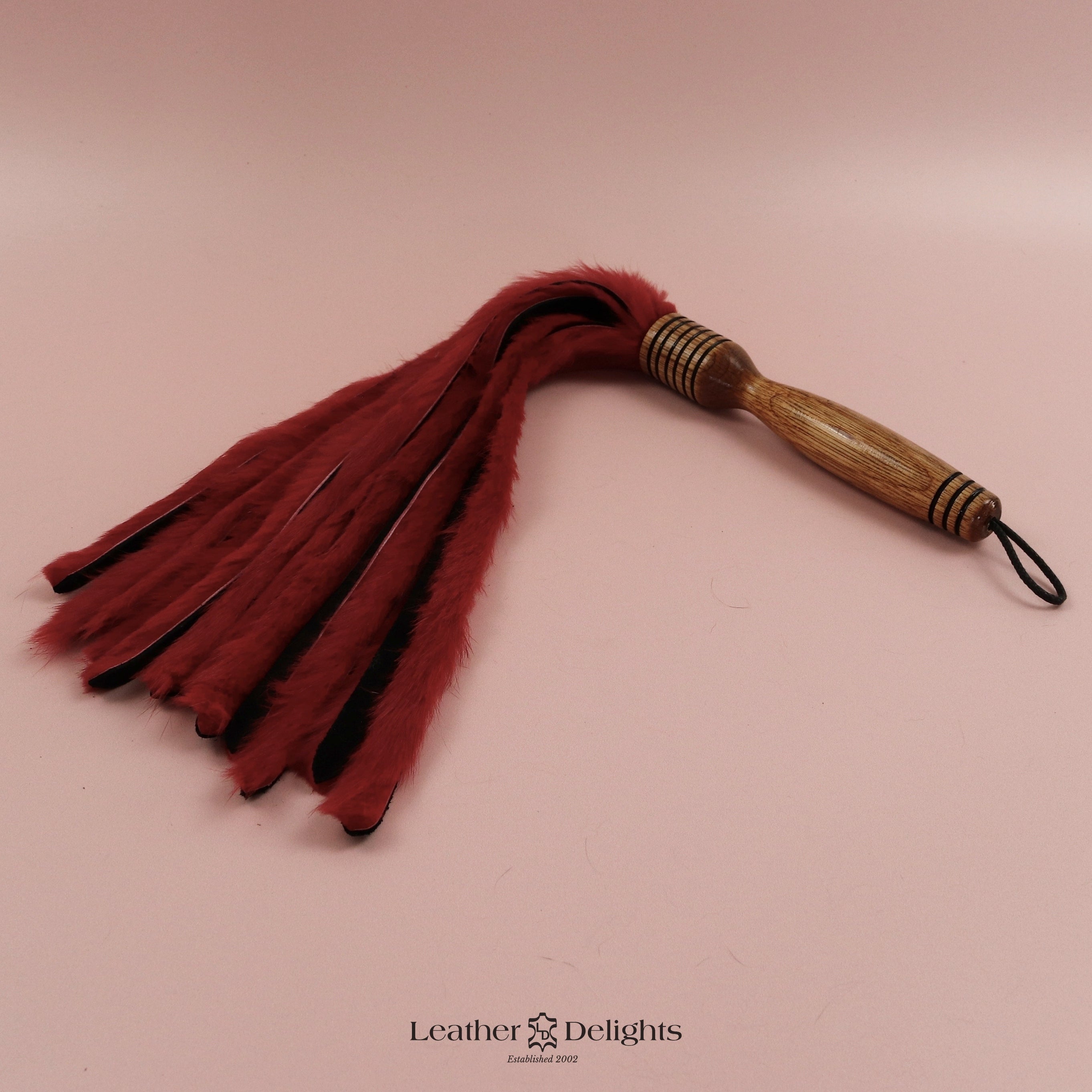 Jade Rabbit Fur Flogger – Leather Delights